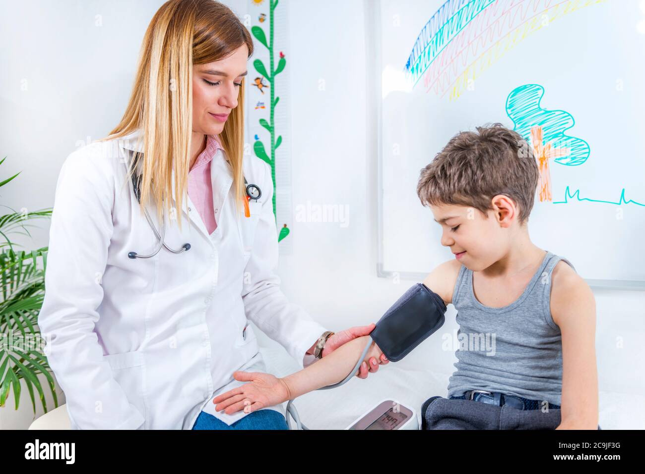 Blood pressure check child hi-res stock photography and images - Alamy