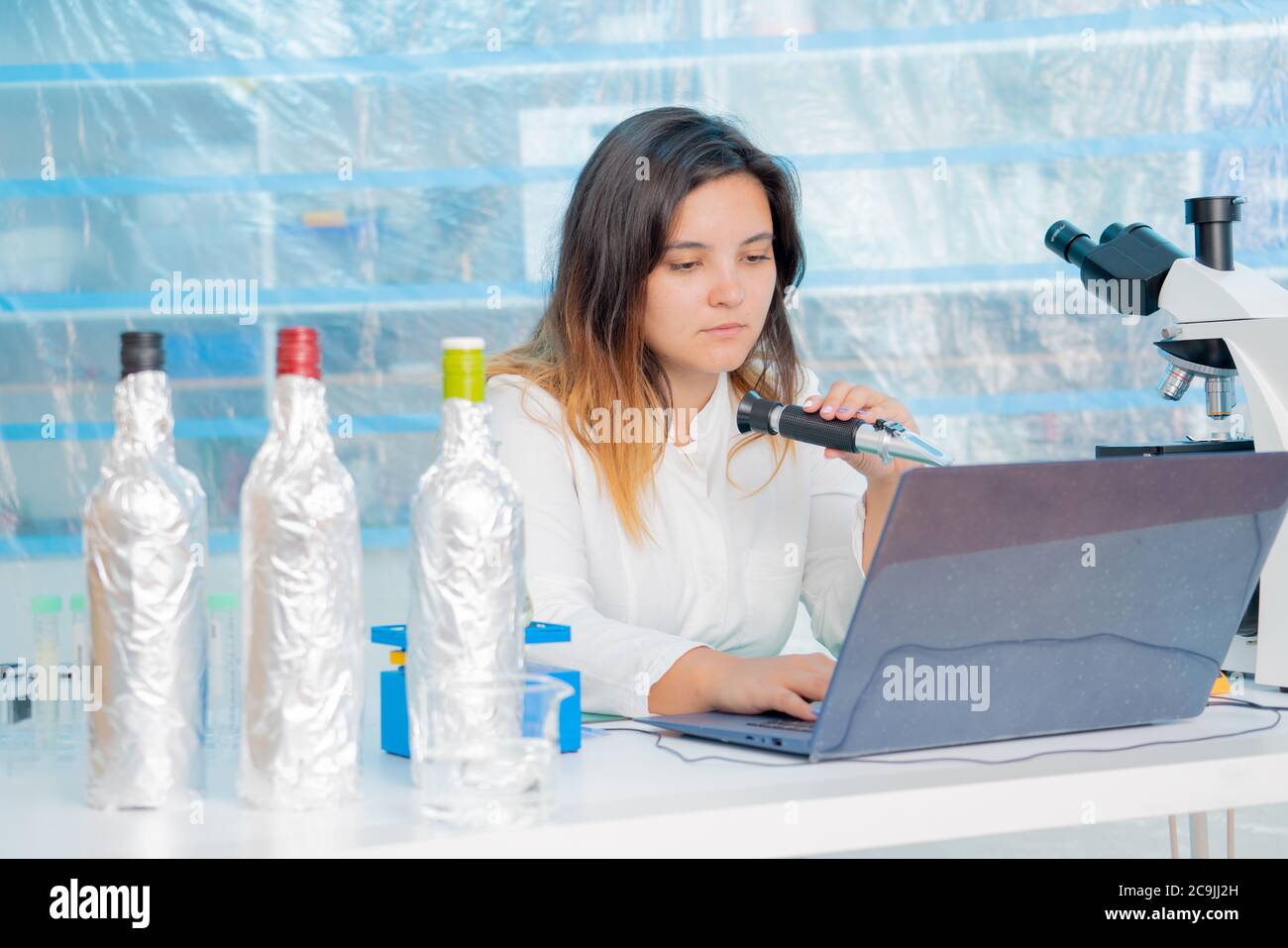 Testing wine in quality control lab Stock Photo - Alamy