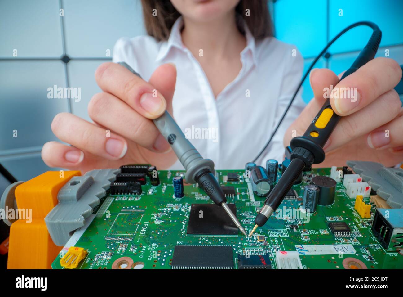 Engineer working on circuit board Stock Photo - Alamy