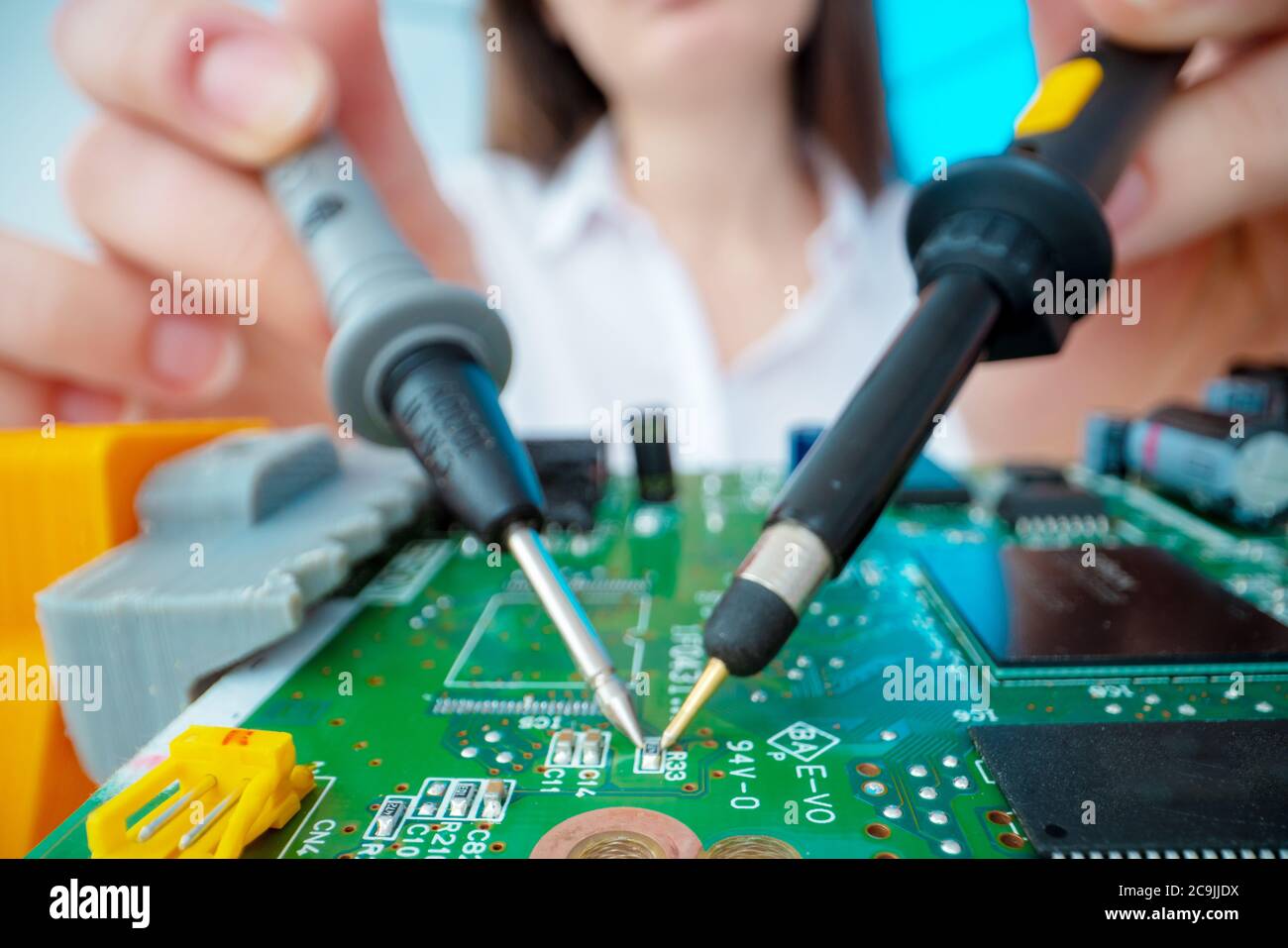 Engineer working on circuit board Stock Photo - Alamy