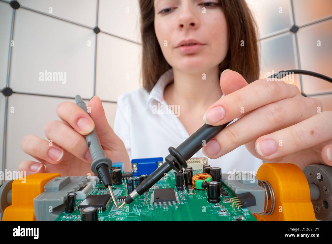 Engineer working on circuit board Stock Photo - Alamy