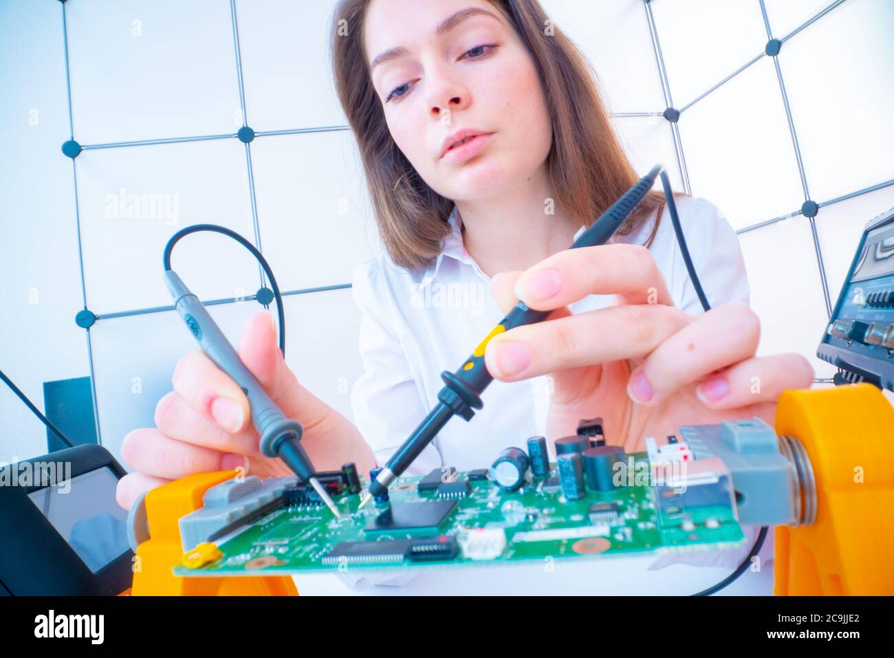 Engineer working on circuit board Stock Photo - Alamy