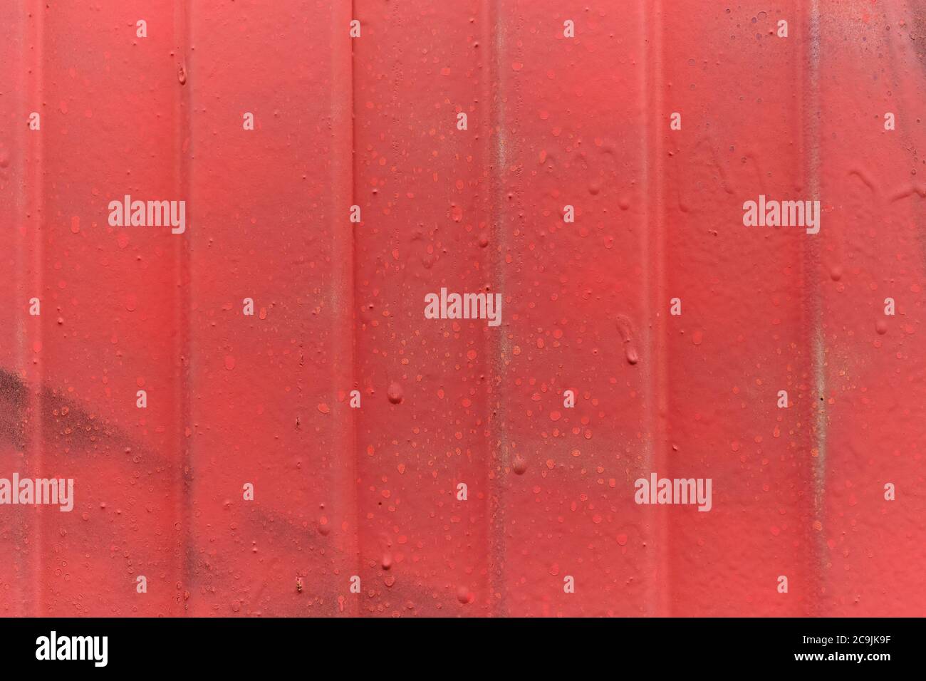 Red old metal siding wall close up Stock Photo - Alamy