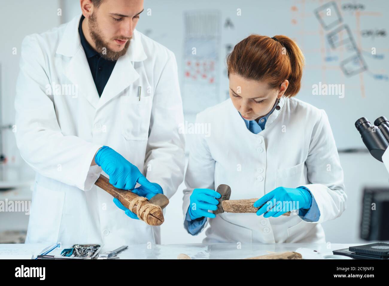 Archaeology researcher in laboratory reconstructs usage of ancient ...