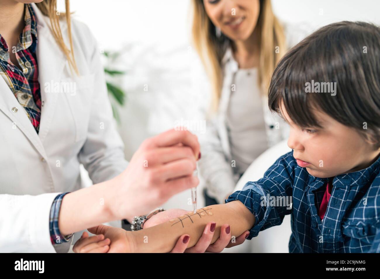 Allergy skin prick tests on little boy's arm Stock Photo - Alamy