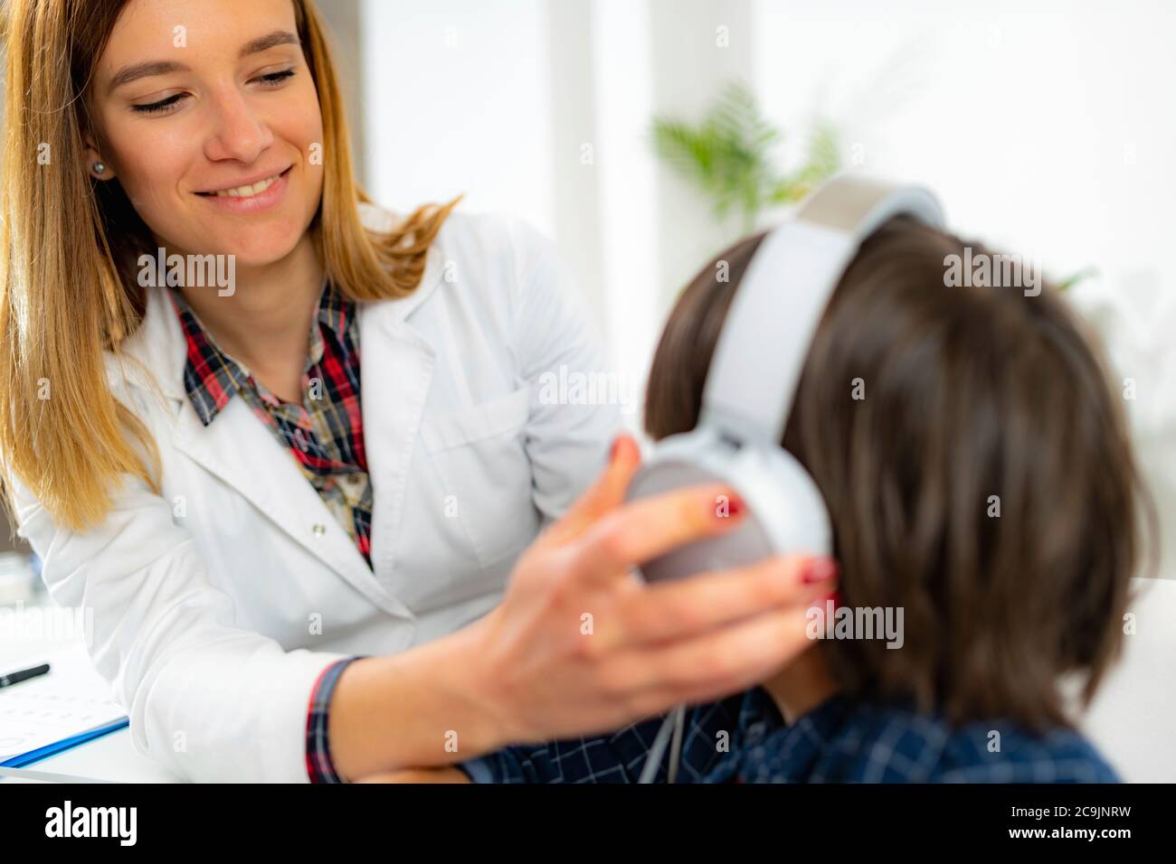 Child hearing headphones test doctor hi-res stock photography and ...