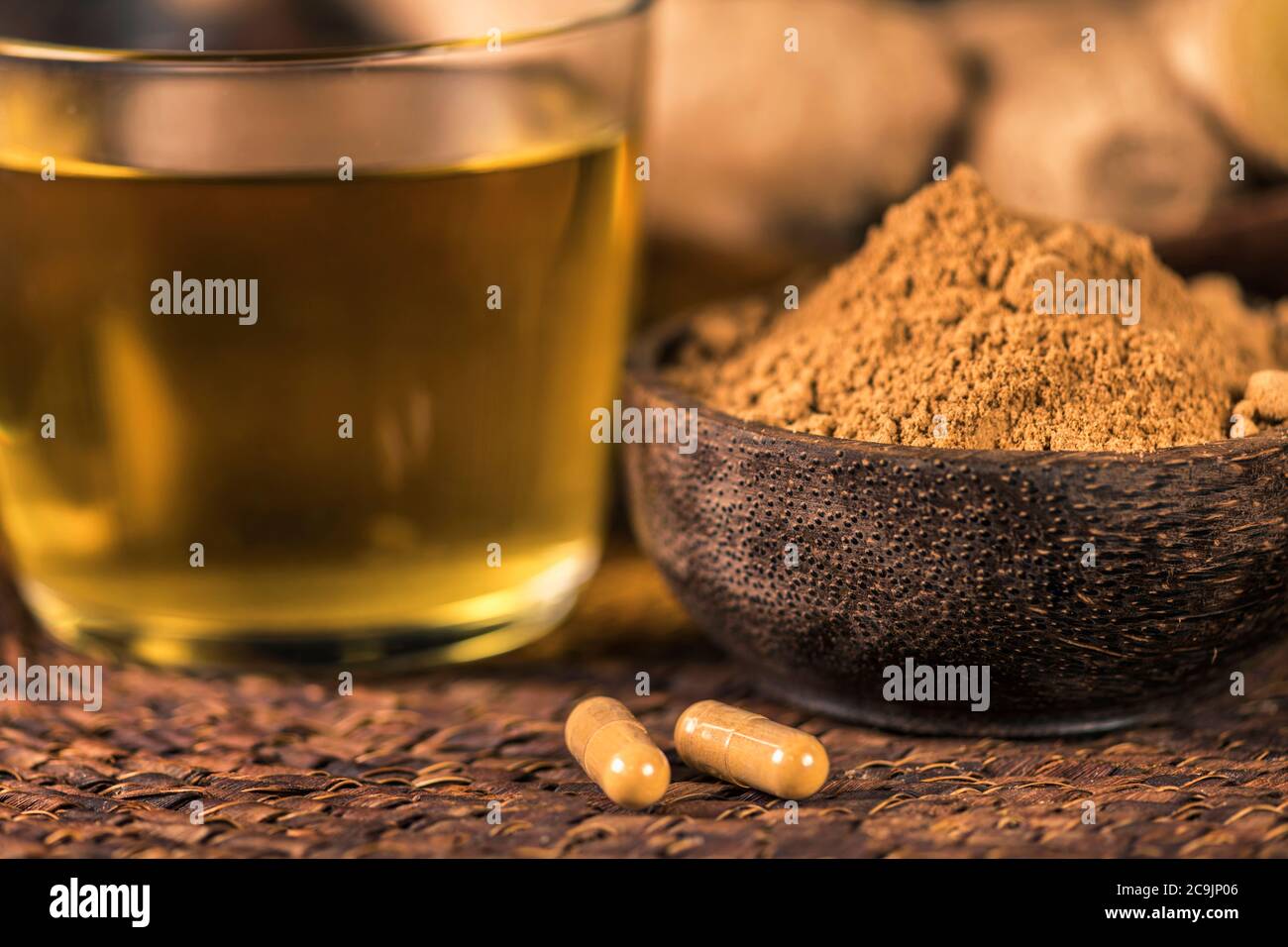 Ginger herbal supplement capsule, ginger ground spice powder, tea, and ...