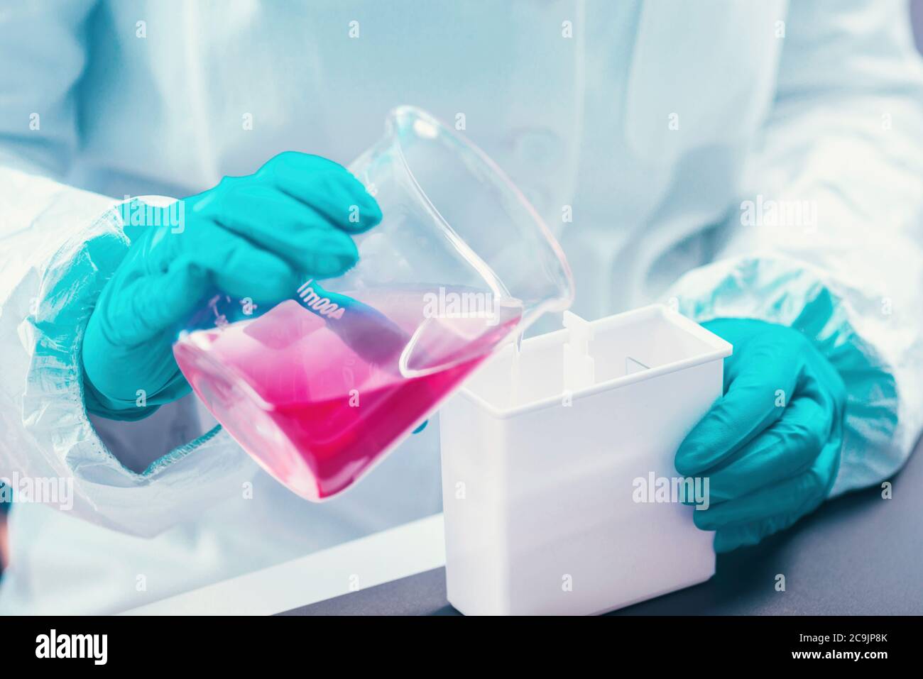 Microbiology. Technician working with bacteria strains Stock Photo - Alamy