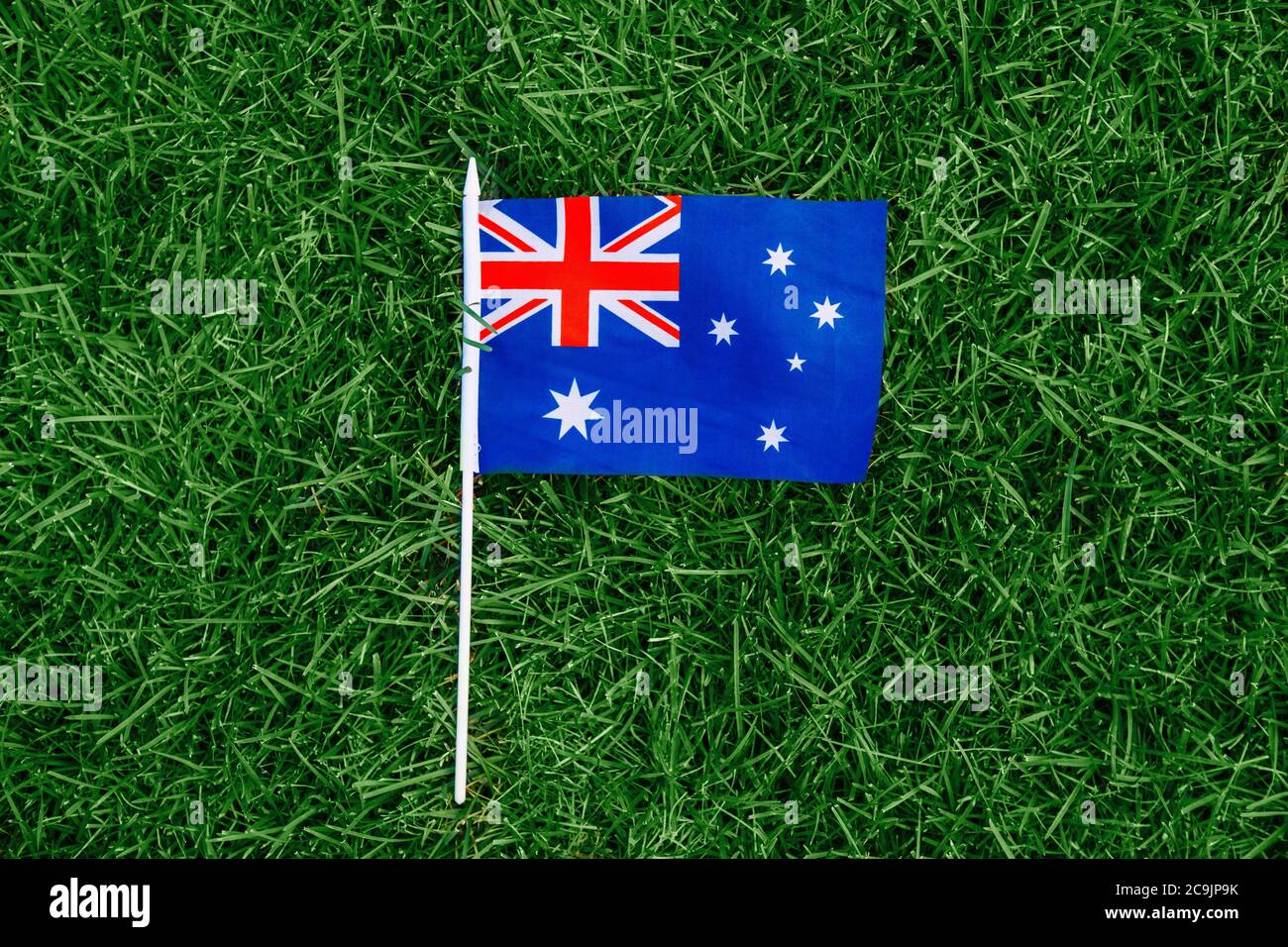 Australian flag lying on green grass. Australia day national holiday ...