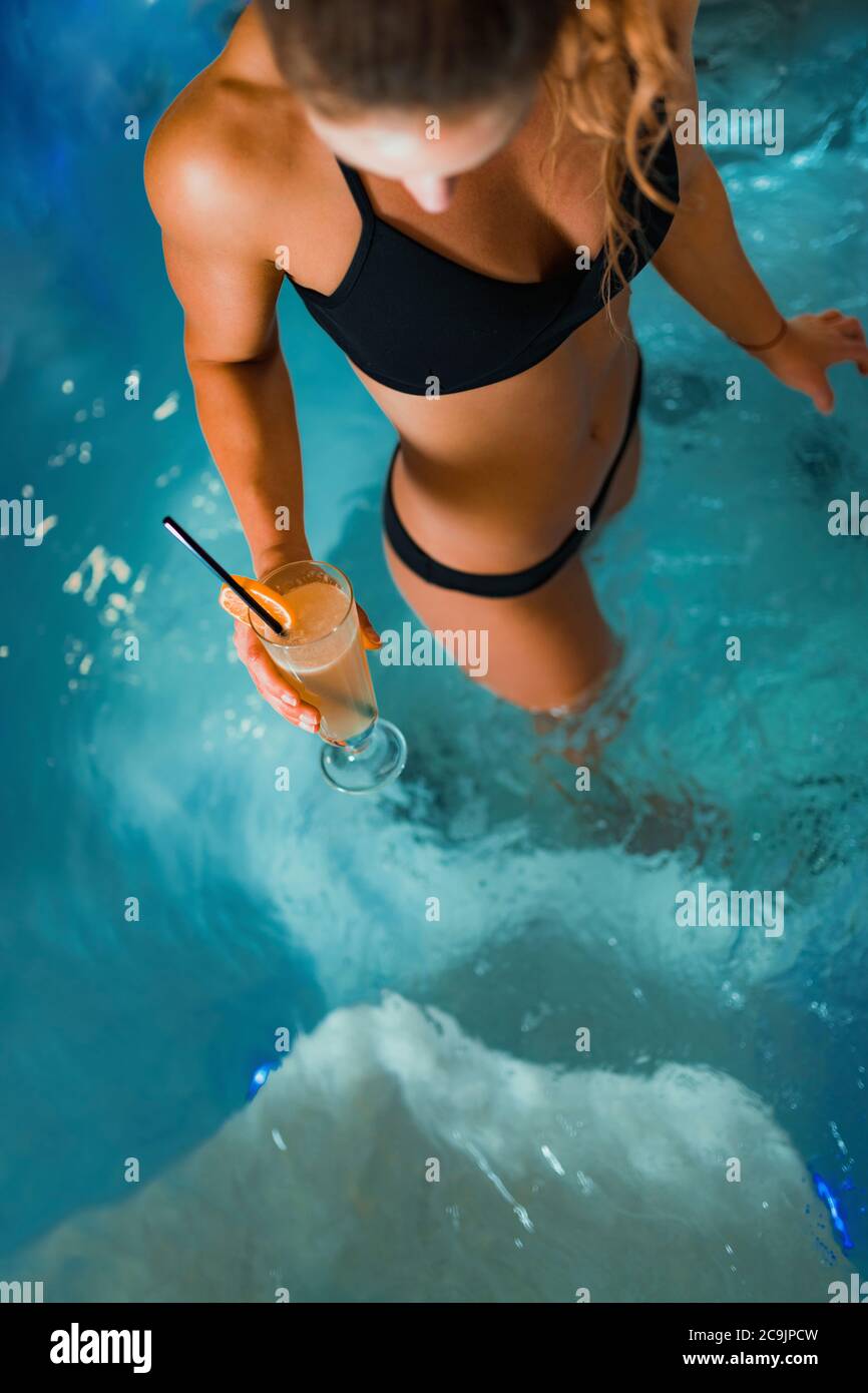 Woman relaxing at a spa in the hot tub hi-res stock photography and images - Alamy