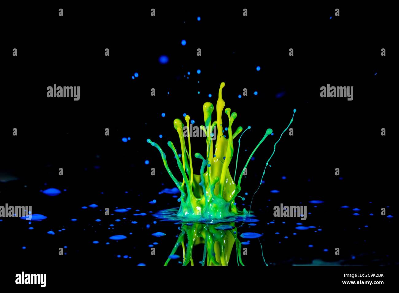 Colorful paint splashing hi-res stock photography and images - Alamy