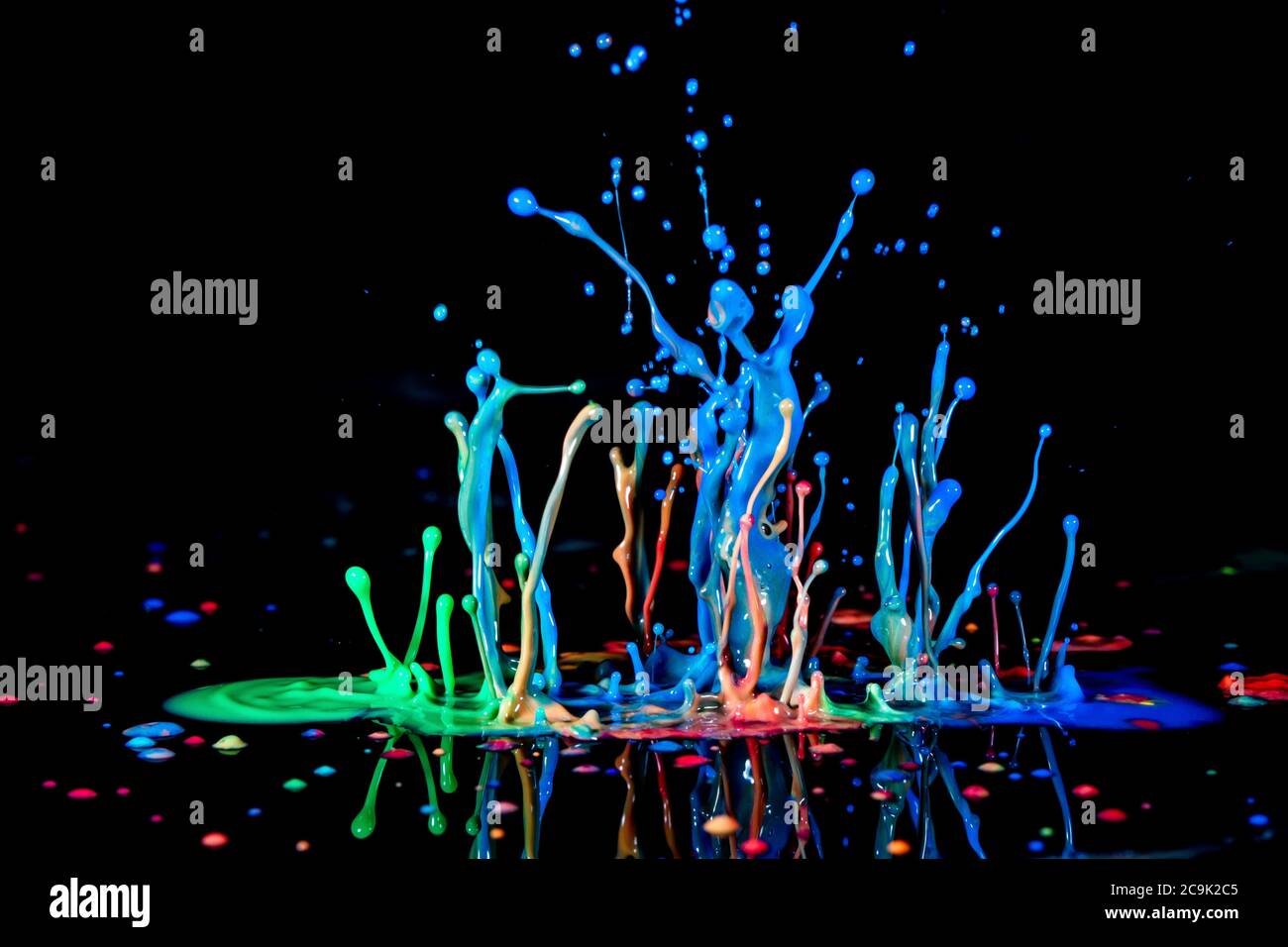 Colorful paint splashing hi-res stock photography and images - Alamy