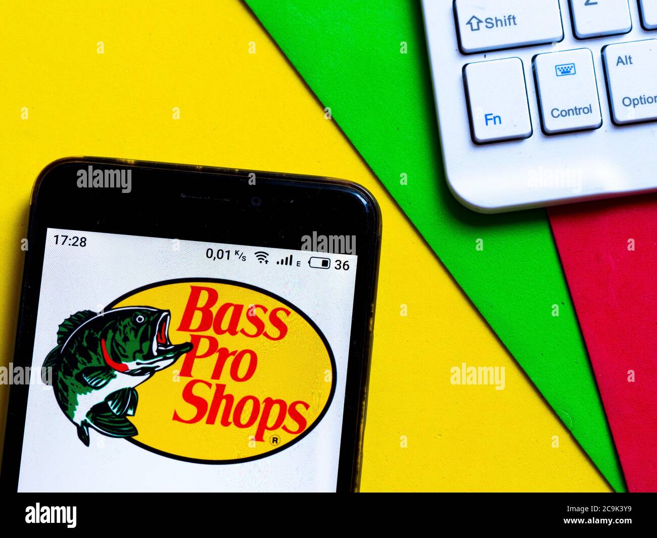 In this photo illustration e-commerce a Bass Pro Shop logo is seen ...