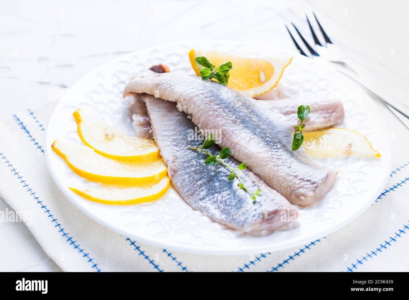 Dutch herring. Traditional Dutch food, marinated fish fillet with onion ...