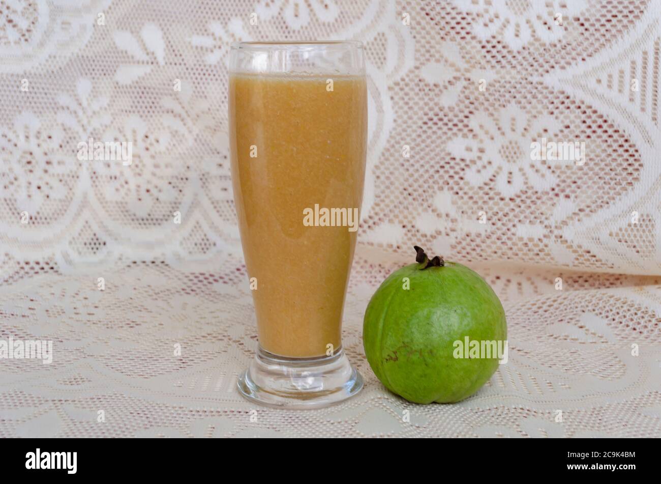 Full Glass Of Guava Juice Stock Photo - Alamy