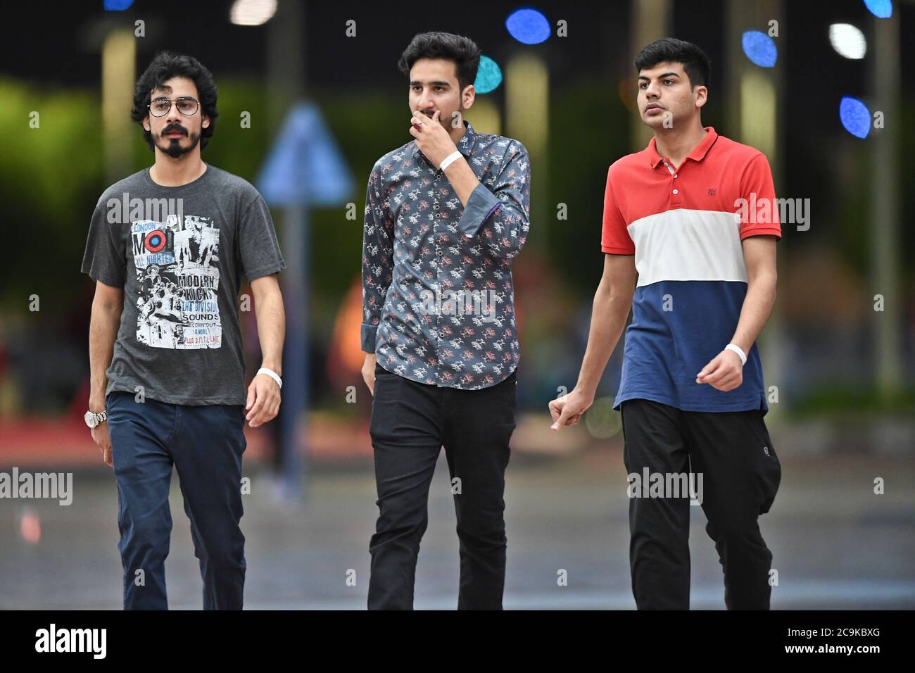 Men in the streets of Doha, Qatar Stock Photo - Alamy