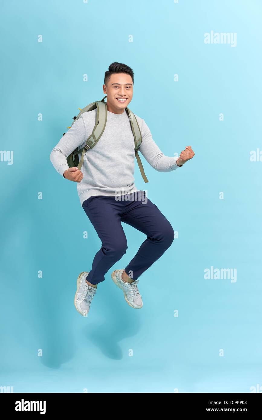 Attractive young Asian man worried and running fast to be late Stock ...