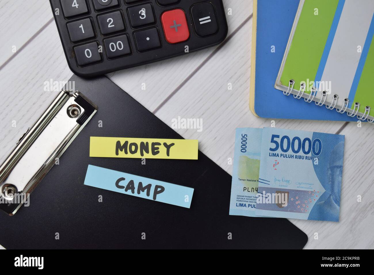 Money Camp text write on sticky notes isolated on office desk Stock ...