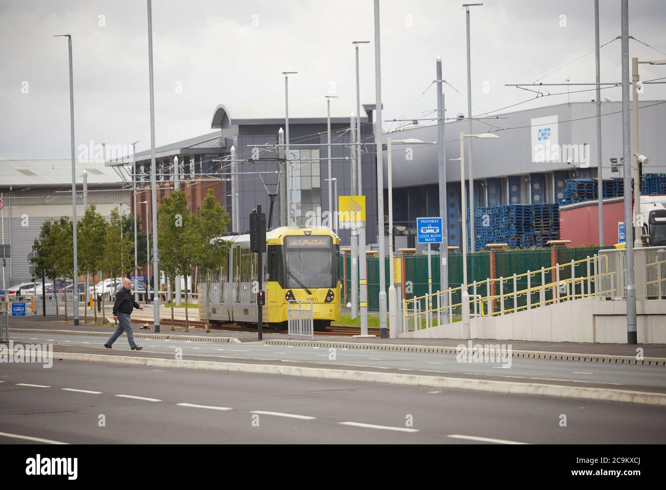 Modern scene a Bombardier M5000 METROLNK tram working through Trafford ...
