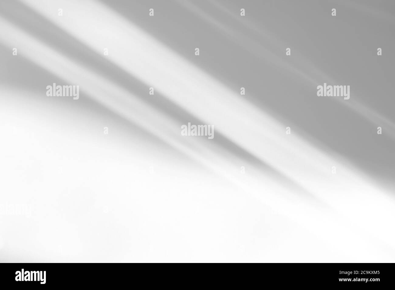 Organic drop shadow on a white wall Stock Photo - Alamy