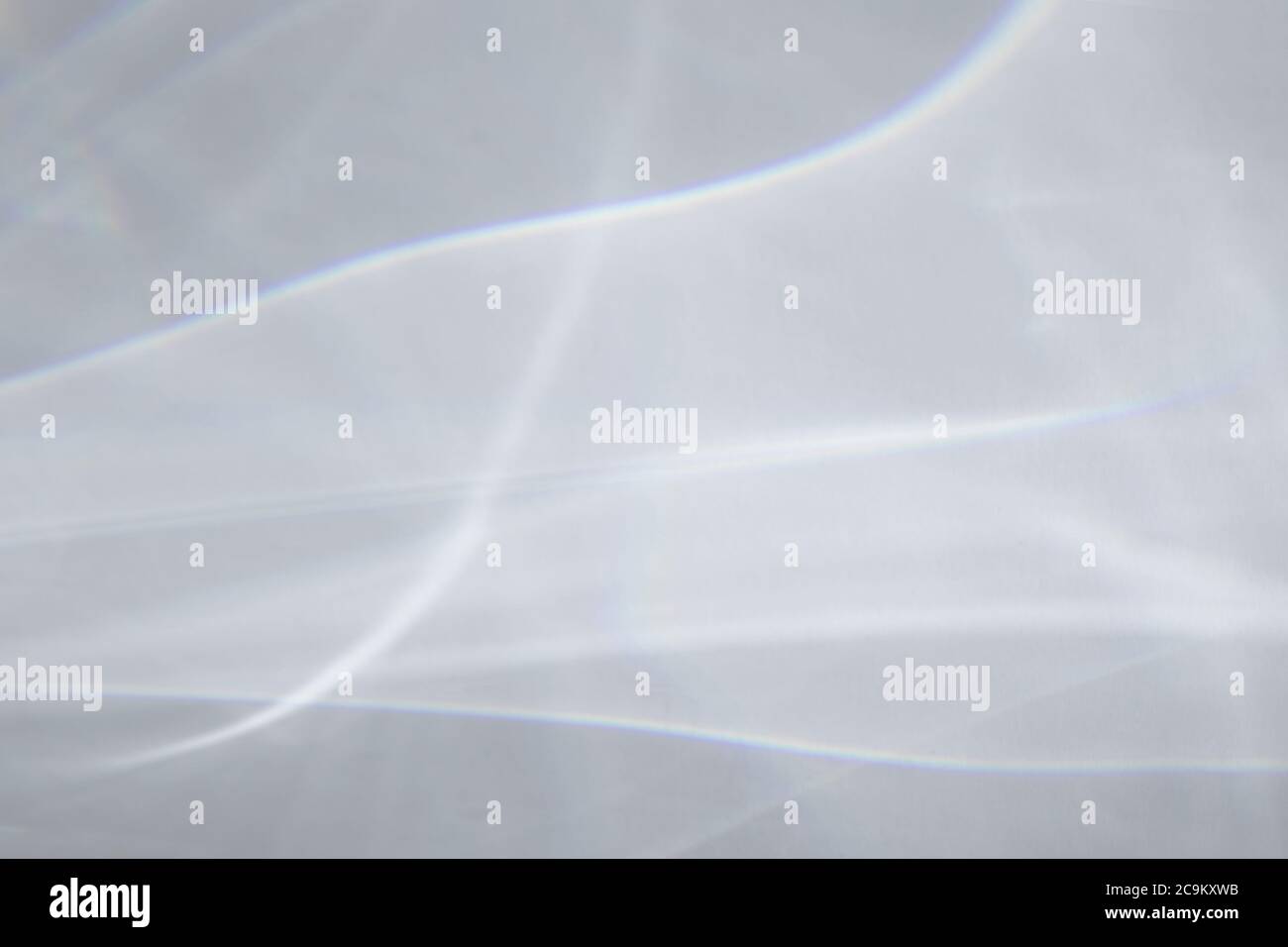 shadow and light caustic effect on a white wall Stock Photo - Alamy