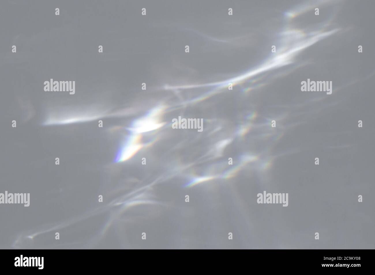 shadow and light caustic effect on a white wall Stock Photo - Alamy