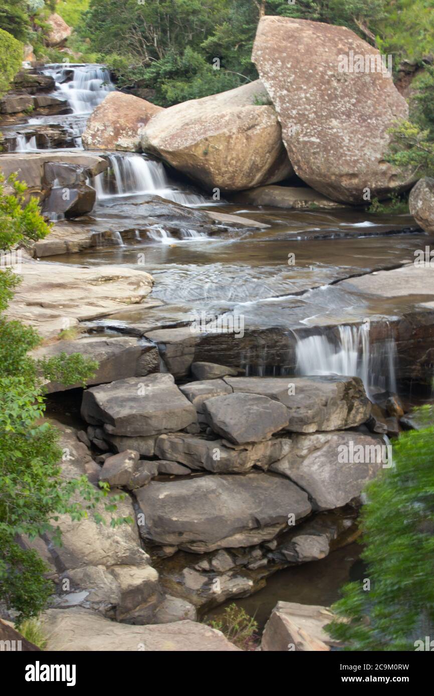 Early morning at the Cascades, a small picturesque waterfall in the ...