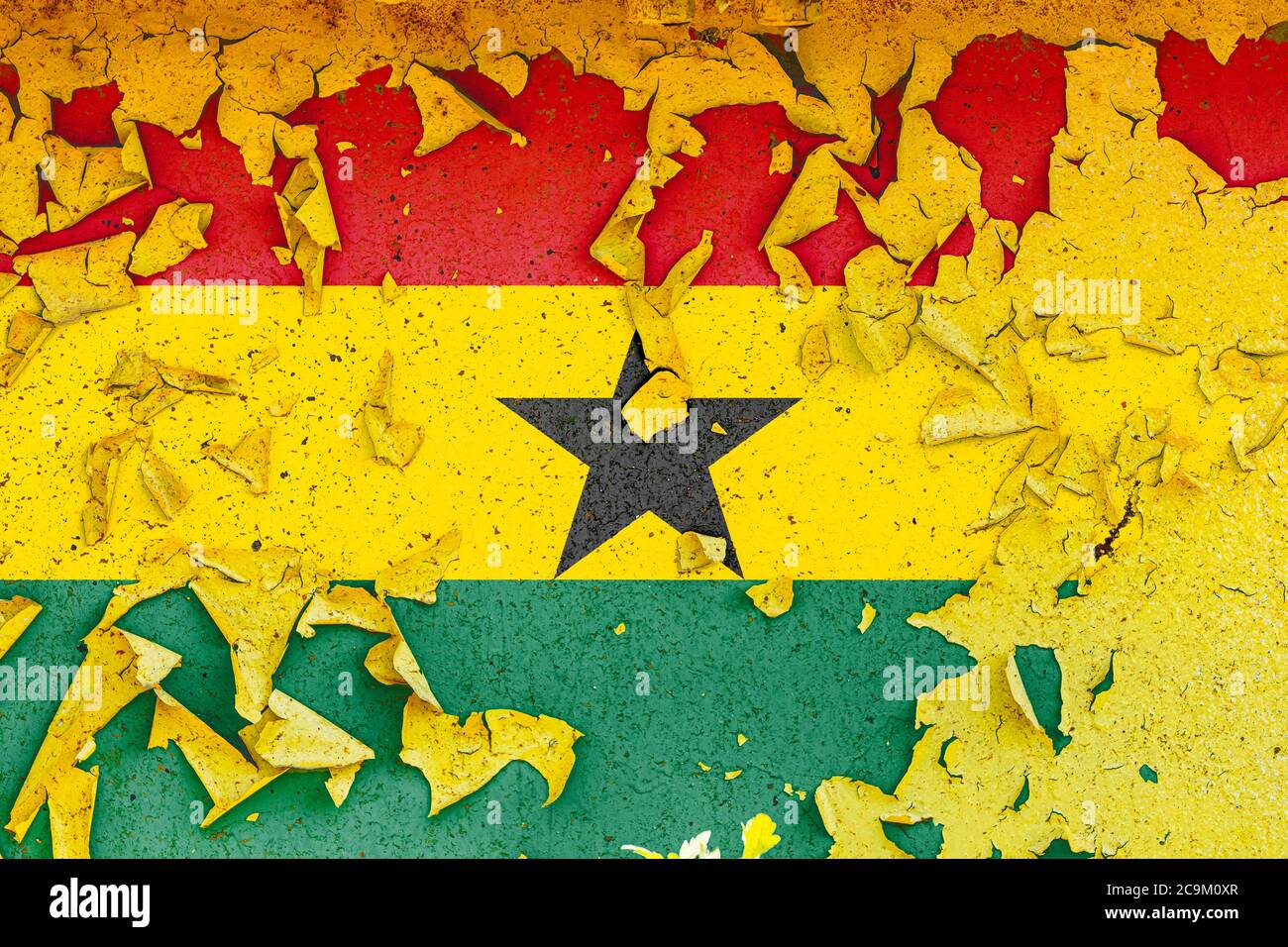 The national flag of Ghana is painted on an old metal wall with ragged ...