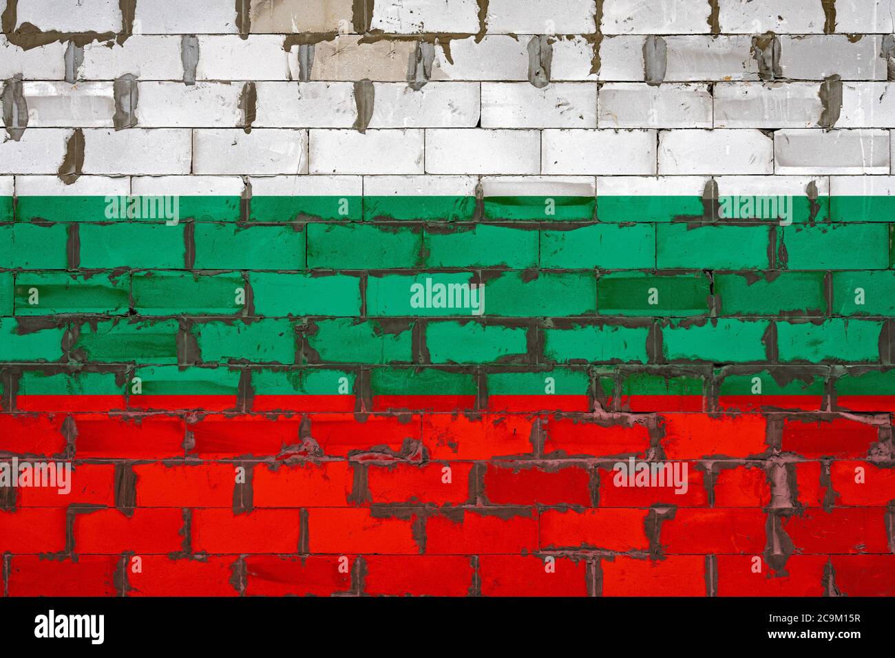 The national flag of Bulgaria painted on a wall of sibit blocks with ...