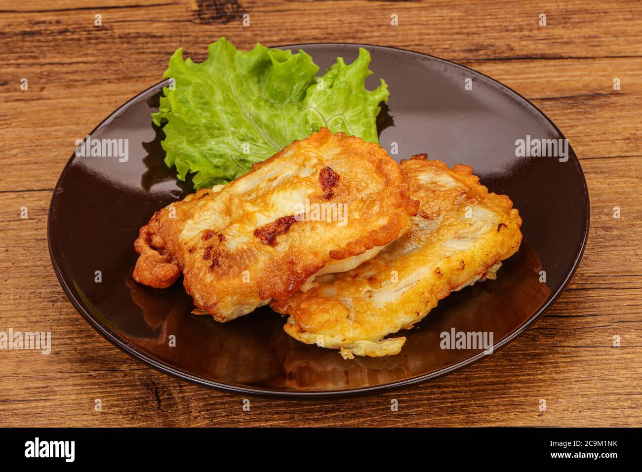Roasted cod fish in the bread Stock Photo - Alamy