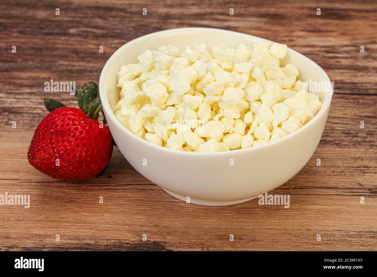 Dietary food - grain cottage cheese in the bowl Stock Photo - Alamy