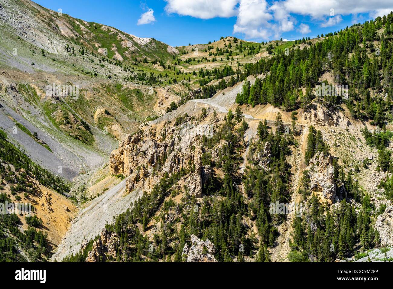 The scenic landscape of the Casse Deserte en route to the Col d'Izoard ...