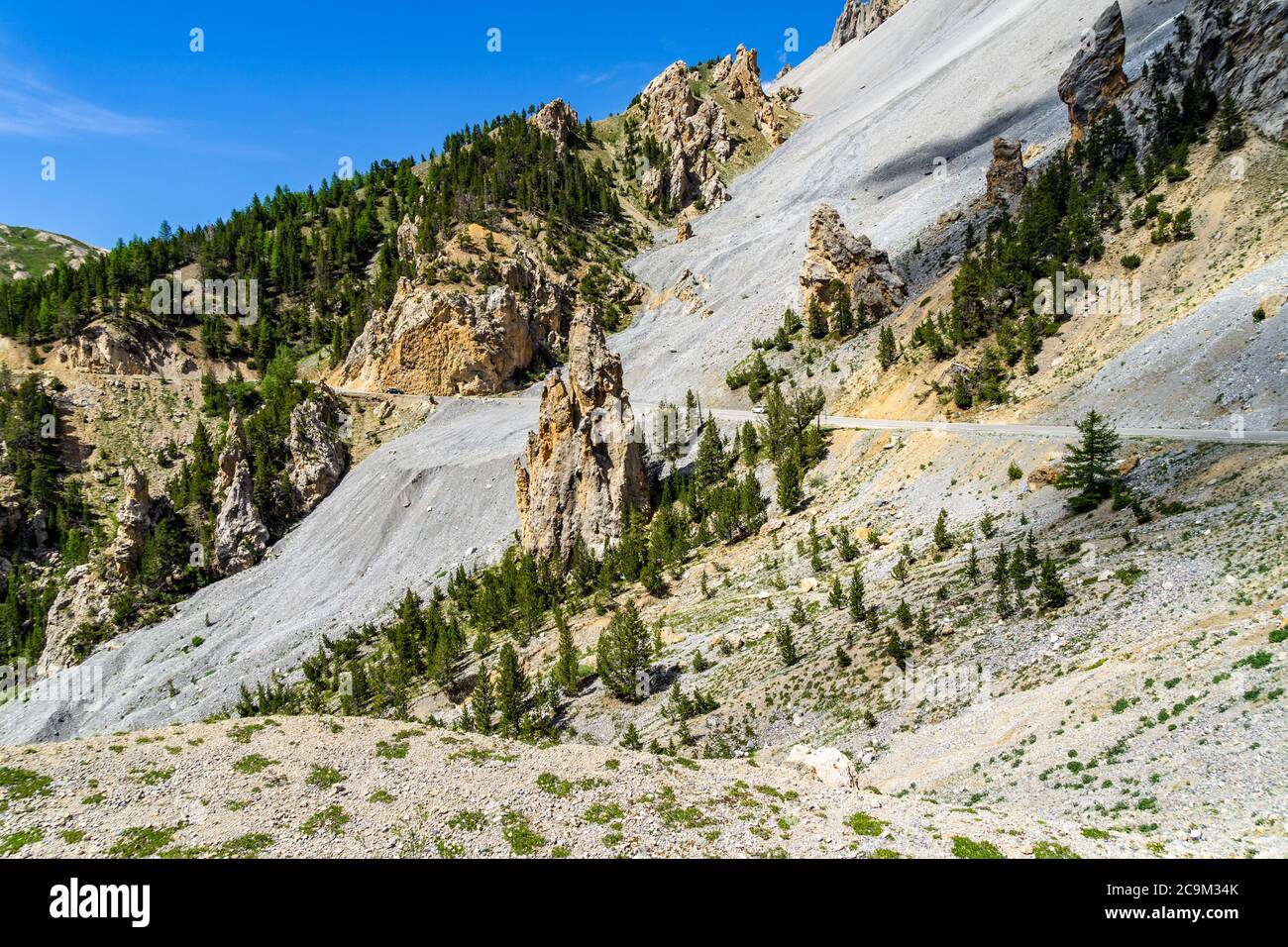The scenic landscape of the Casse Deserte en route to the Col d'Izoard ...