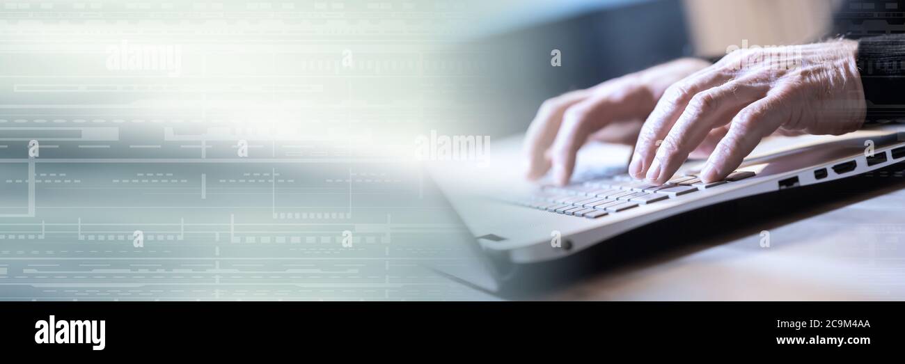 Male hands typing on laptop keyboard; panoramic banner Stock Photo - Alamy