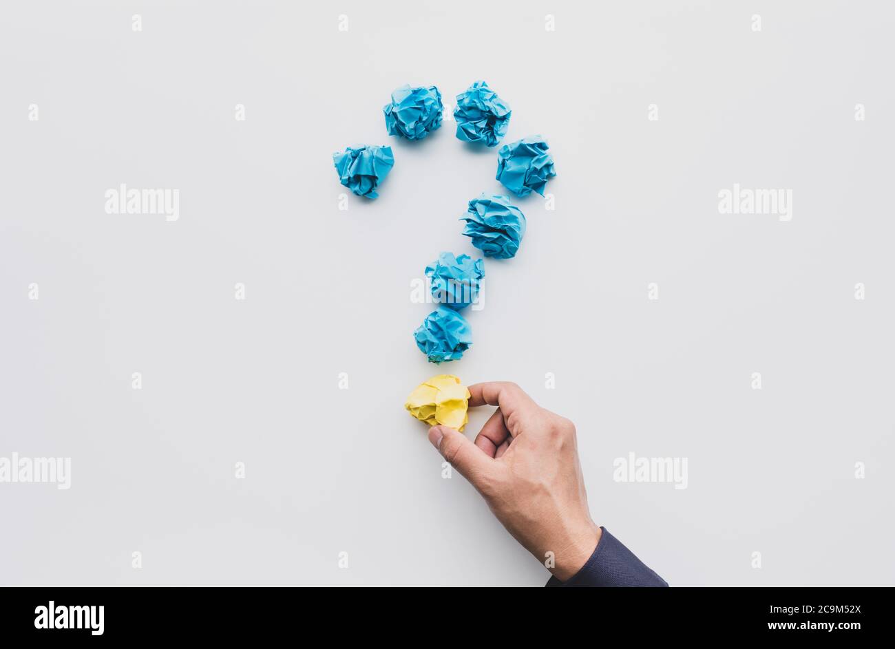 Question and answer or thinking ideas concepts with male hand holding ...