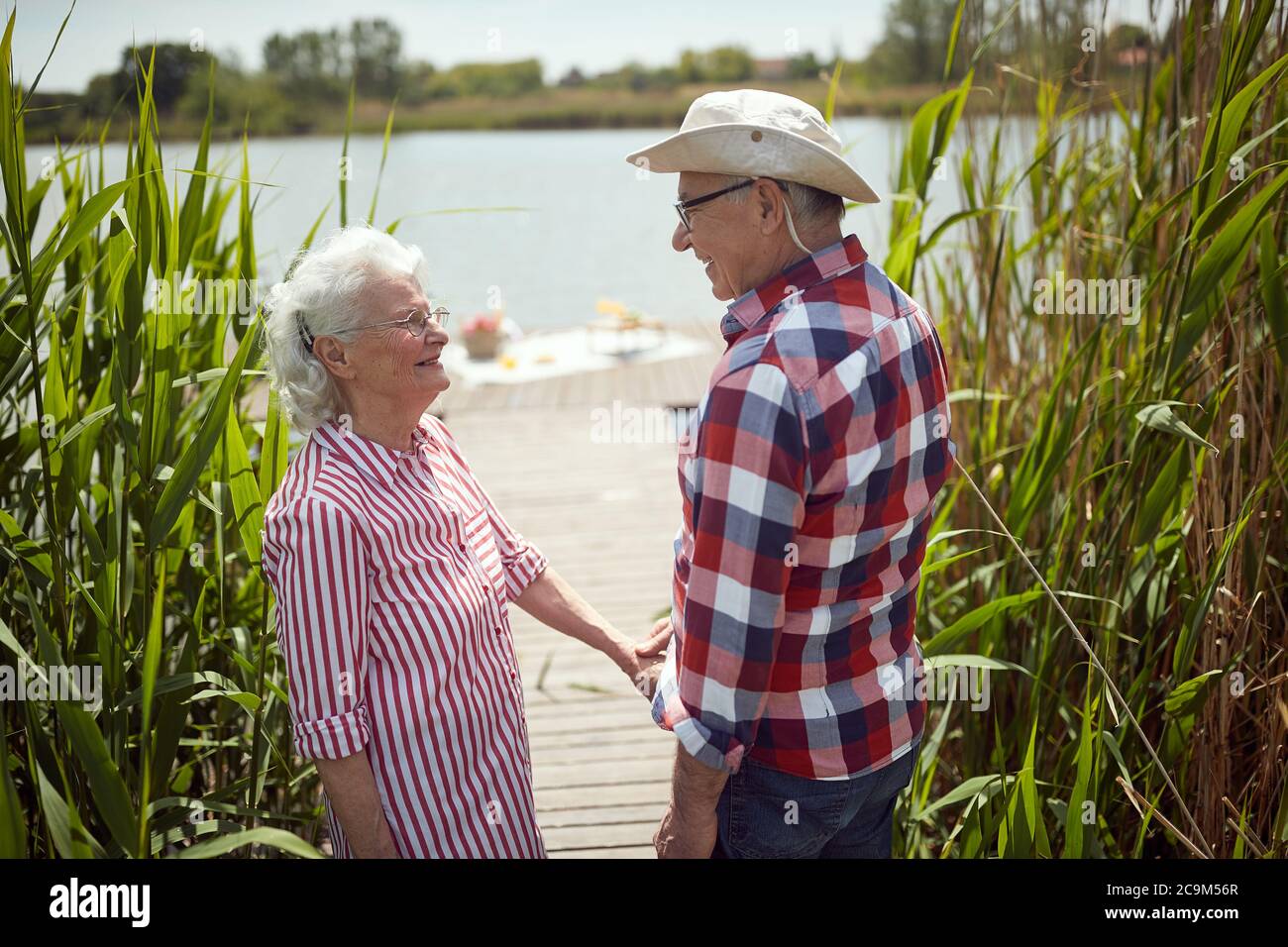 Happy old couple in romantic moments on a sunny day Stock Photo - Alamy
