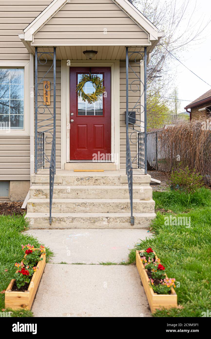 Tan House Red Door