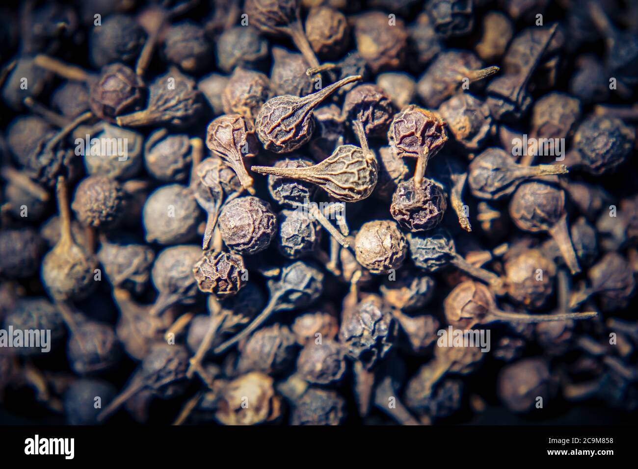 a bunch of dried peppercorns Stock Photo - Alamy