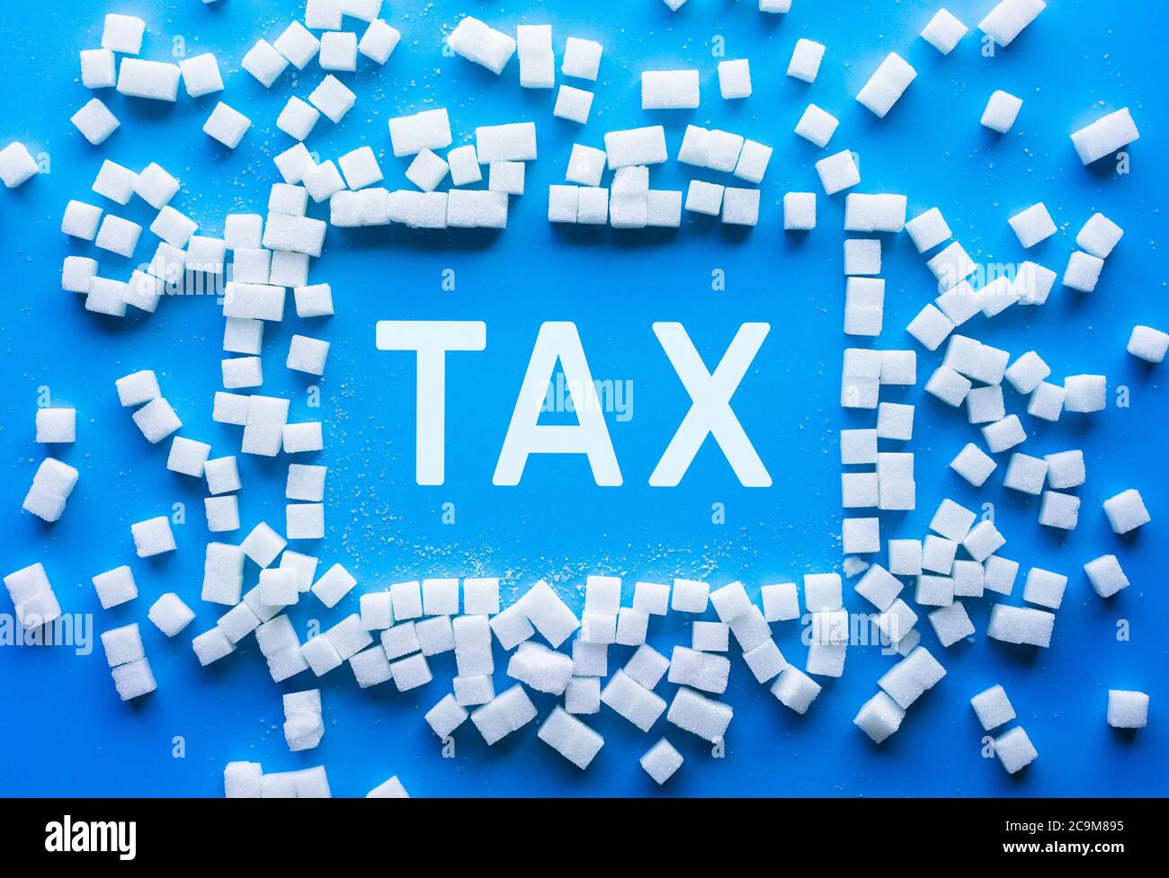 Business sugar tax concepts with taxt on color background.sweet and ...