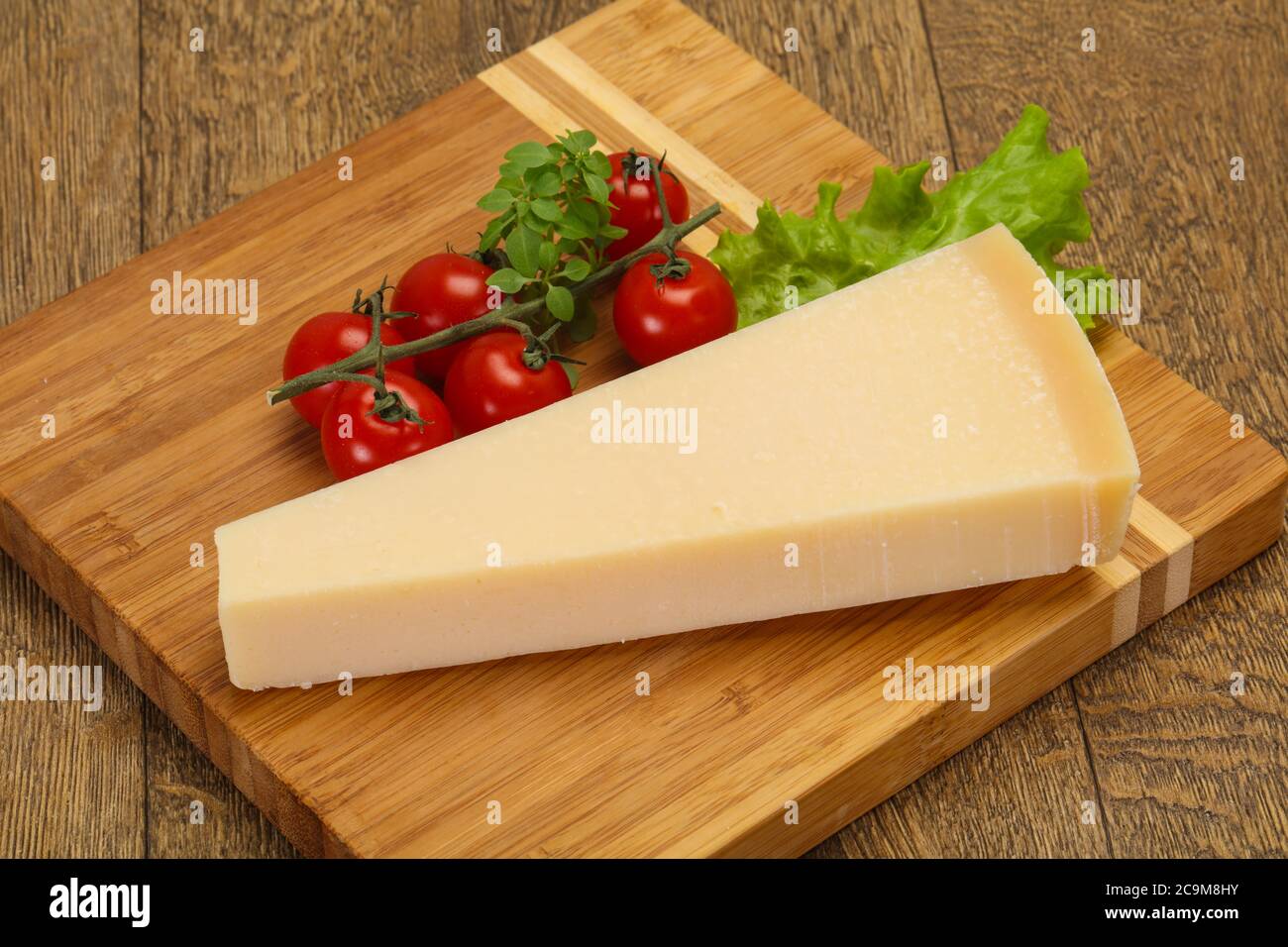 Italian traditional parmesan cheese triangle served salad Stock Photo ...