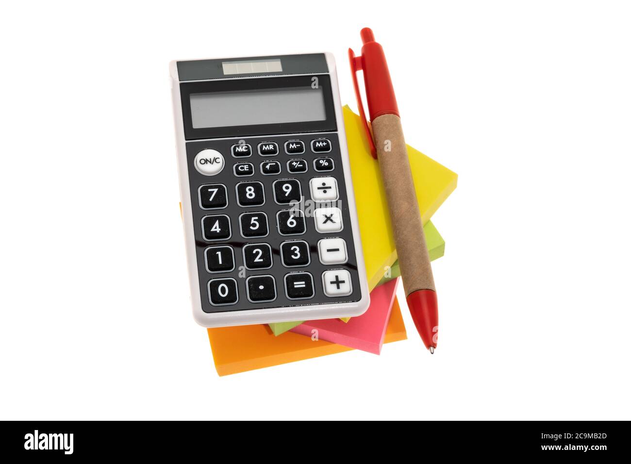 A calculator with some multi coloured notelets and a pen - white ...