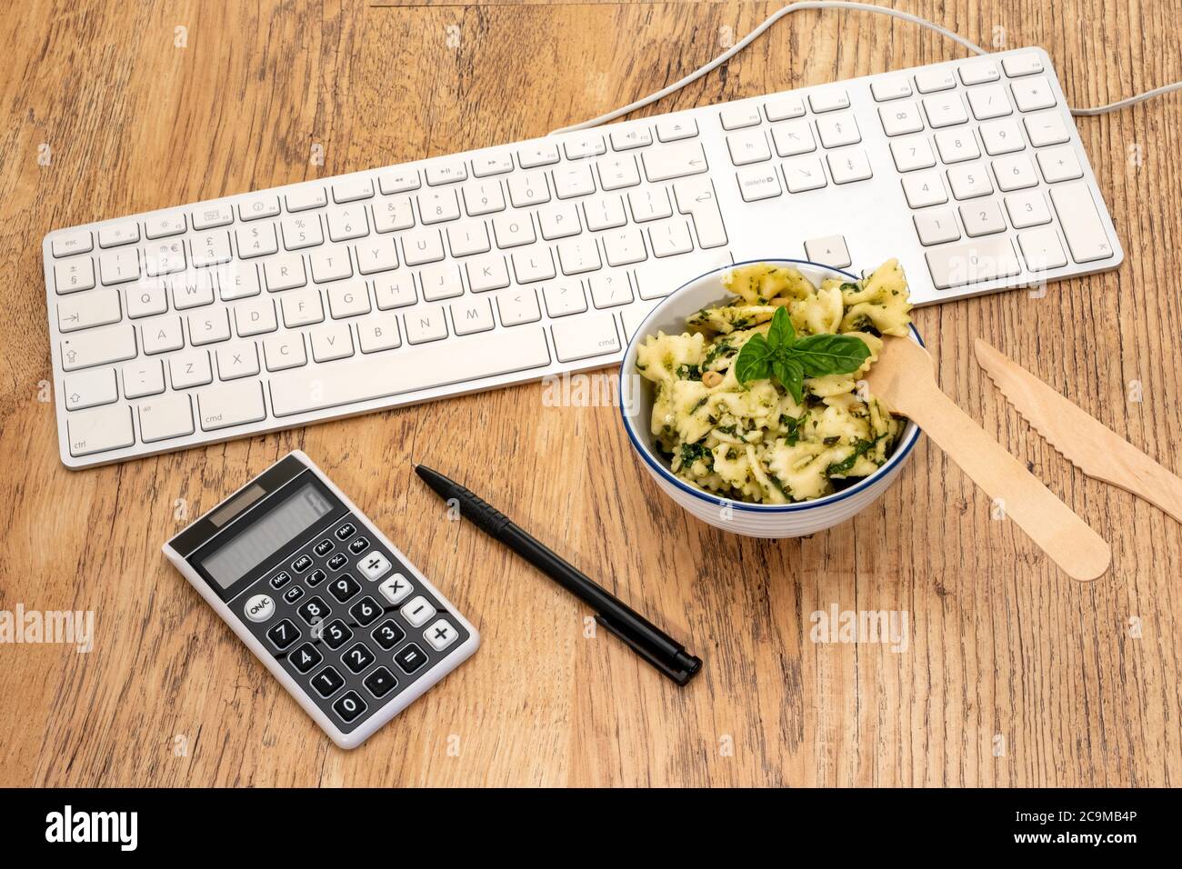Working lunch at the office desk - diet food Stock Photo - Alamy