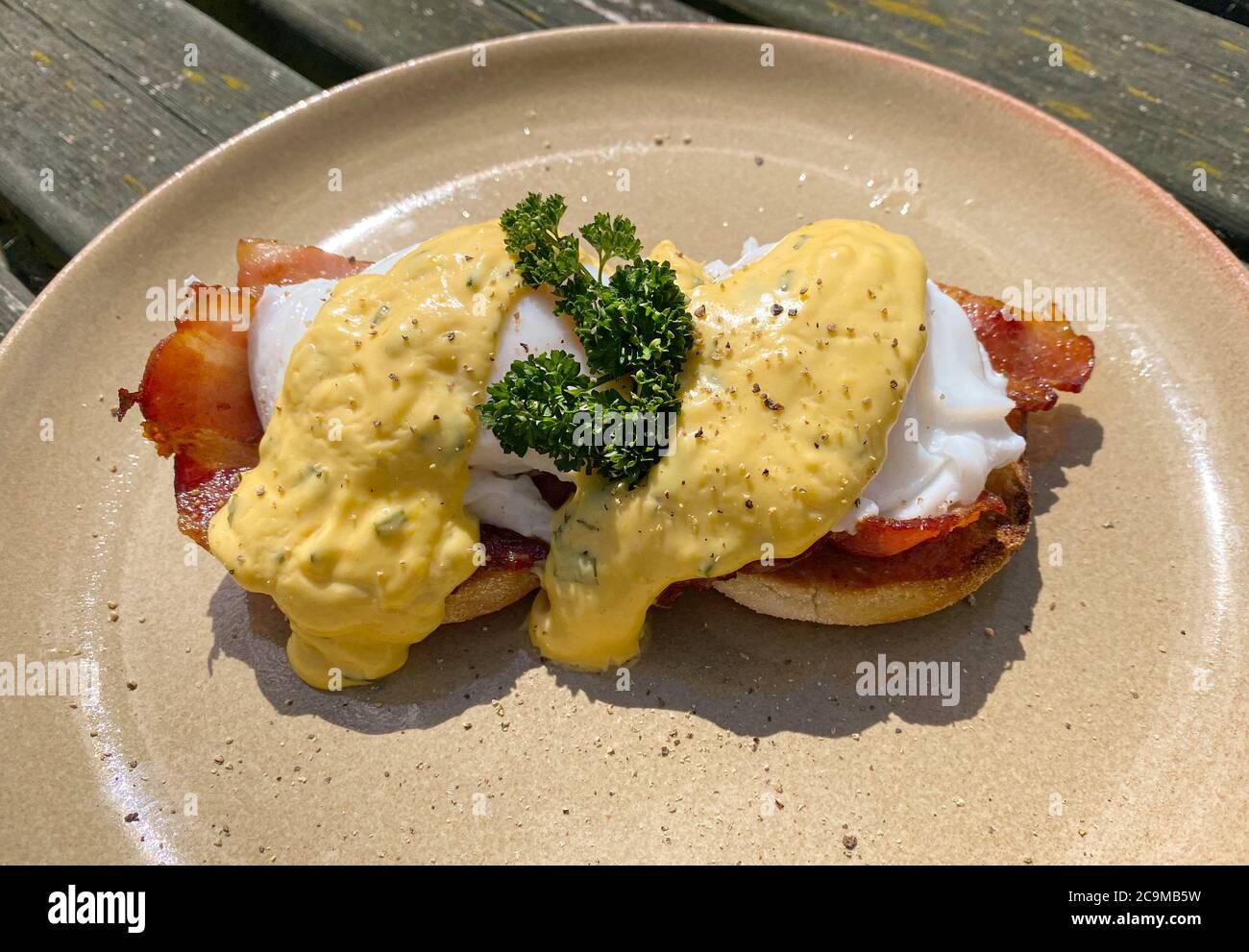 Eggs Benedict with Hollandaise sauce breakfast Stock Photo - Alamy