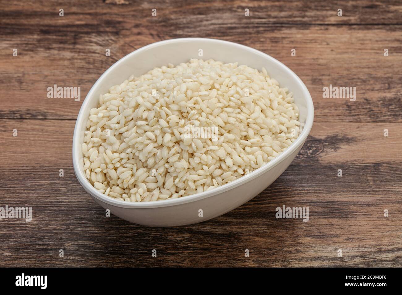 Raw Italian arborio rice for Risotto Stock Photo - Alamy