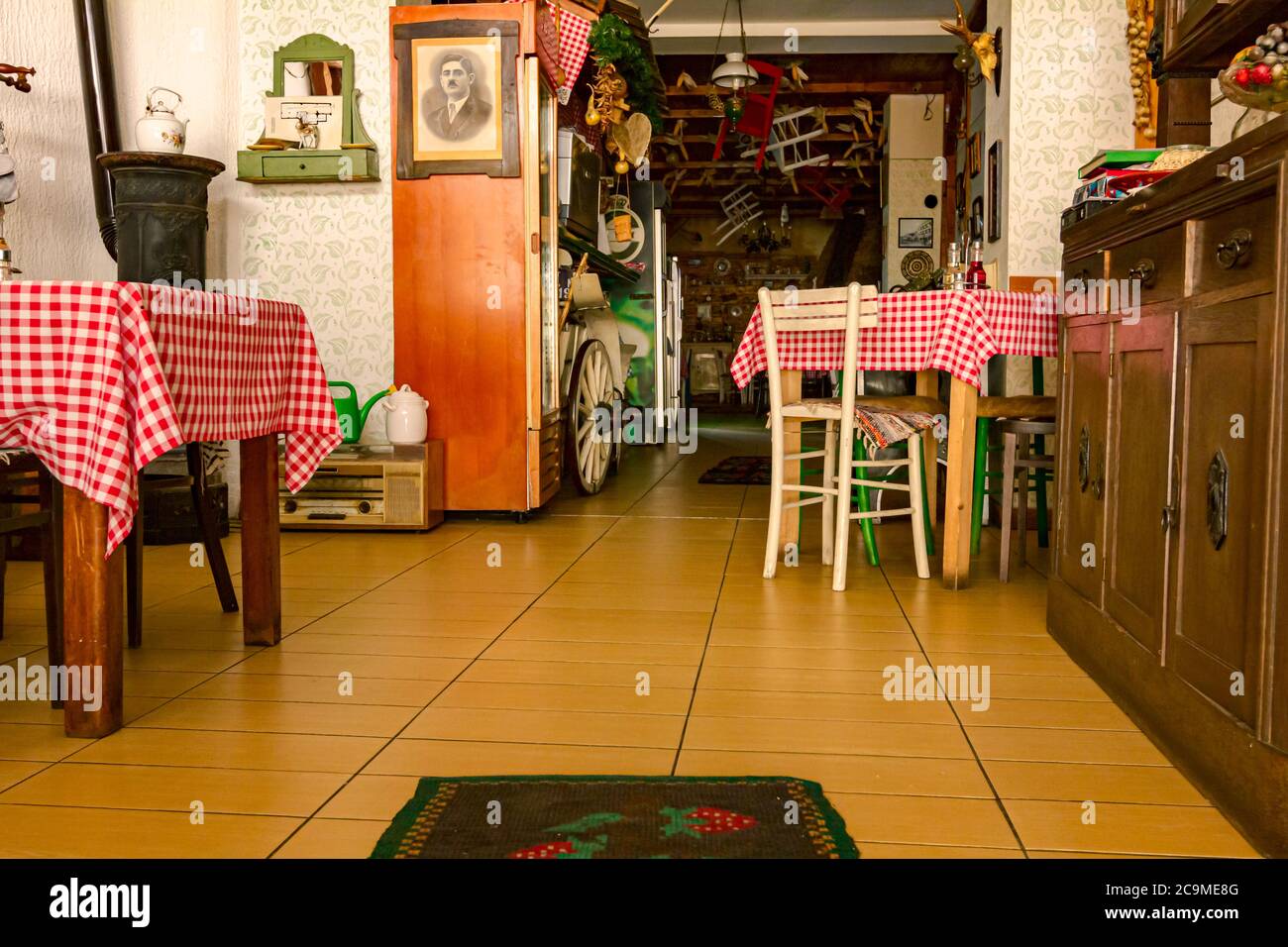 Artistic designed typical retro outdoor restaurant, wooden chairs and ...