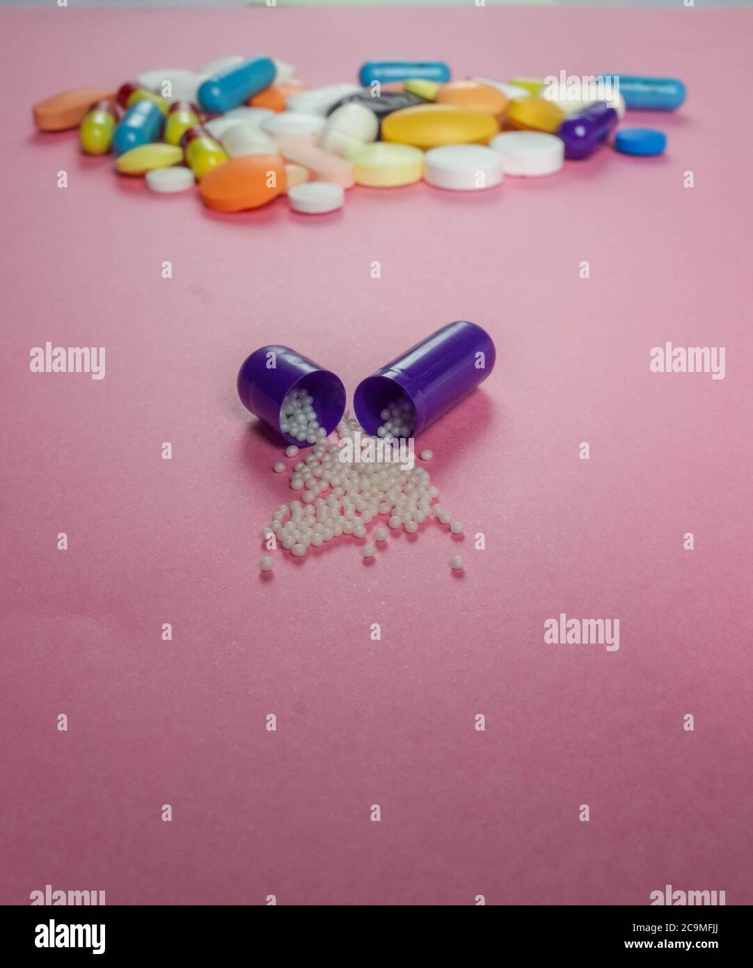 macro photo of open capsule and pills Stock Photo - Alamy
