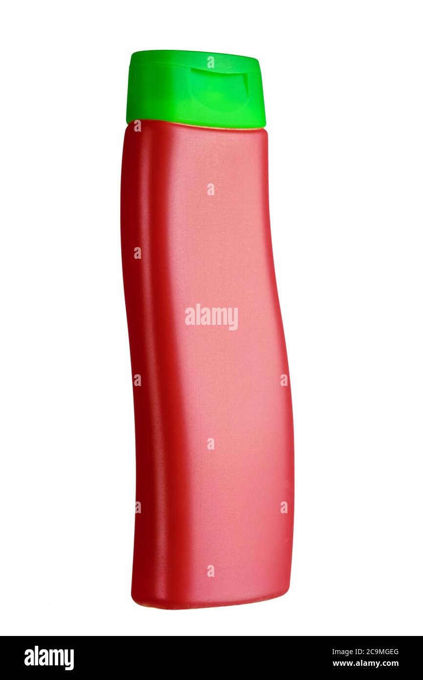 Plastic bottle shampoo of red color with a green cover, isolated on ...