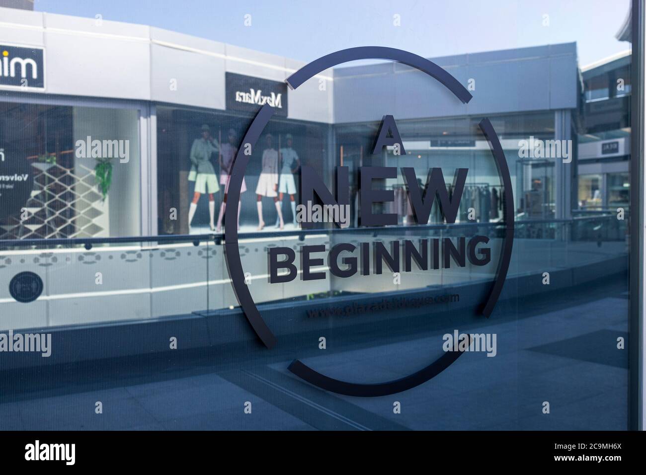 A New Beginning decal on the window of a shop in the Plaza del Duque ...