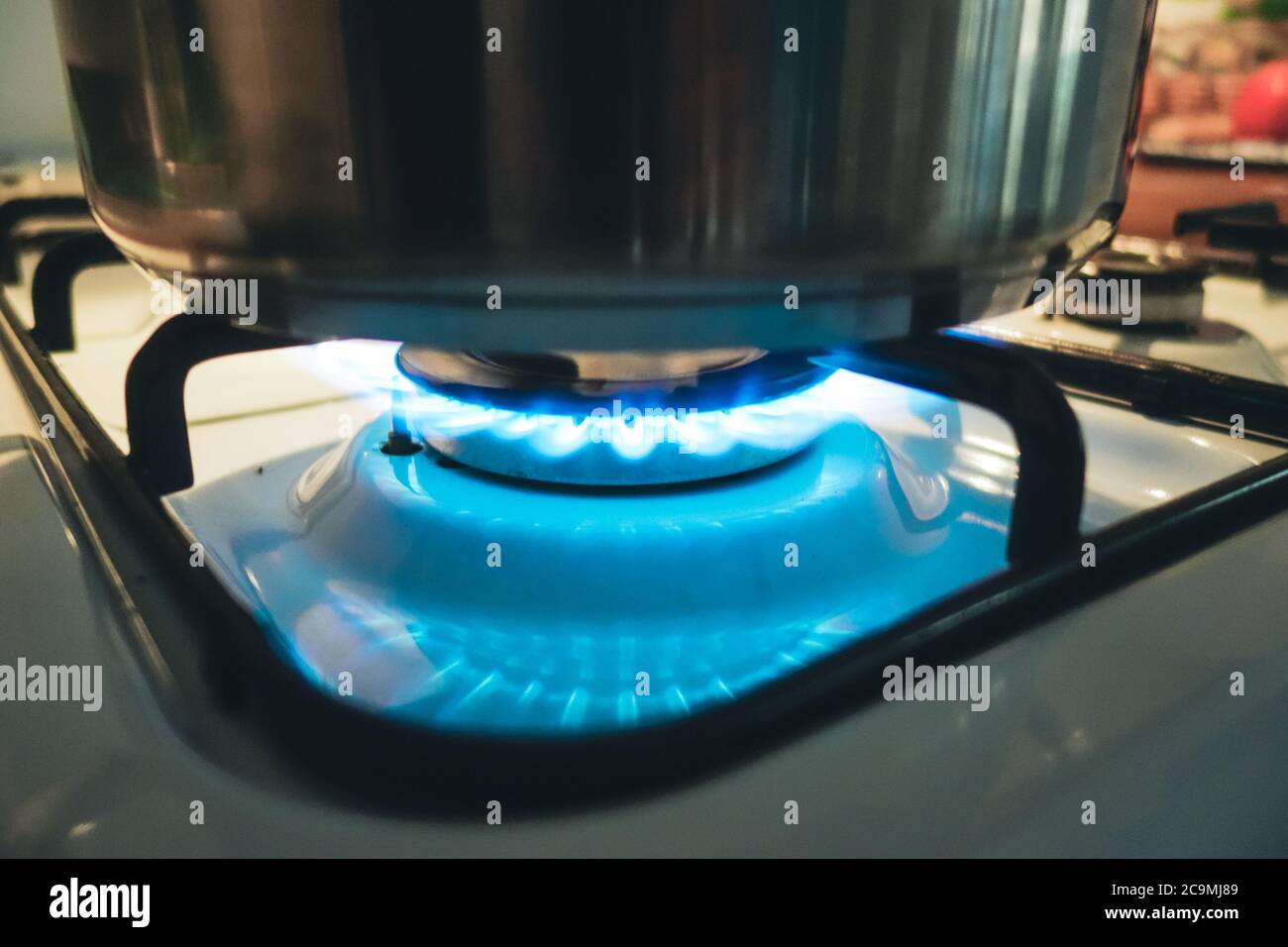 Cooking pan on gas stove close-up view Stock Photo - Alamy