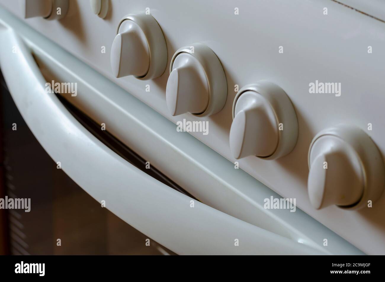Close up White dirty knobs with drops of fat. Knob dial of control ...